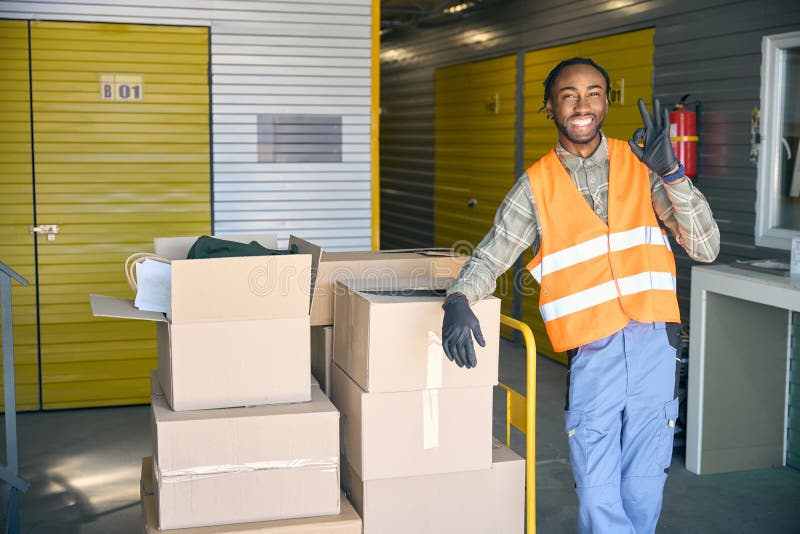 Joyous Loader Approving His Work in Storehouse Stock Photo - Image of ...
