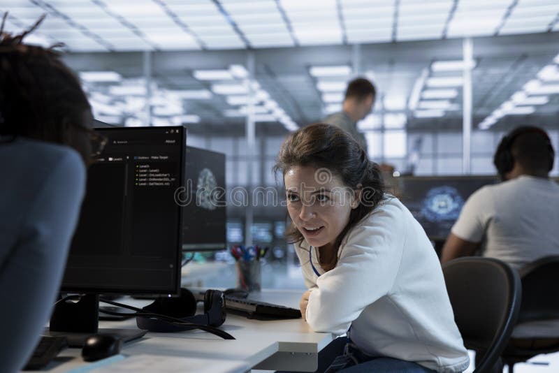 Joyous Technician Chatting with Colleague in Data Center Stock Photo ...