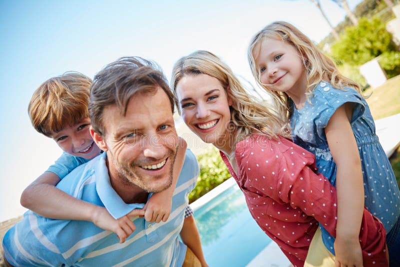 The Joys of Family Life. Portrait of a Happy Family Enjoying a Day ... The Joys of Family Life. Portrait of a Happy Family Enjoying a Day ...