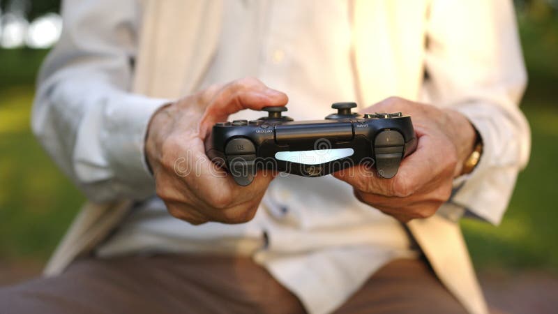Joystick for Playing in the Hands of an Old Man Stock Footage - Video ...