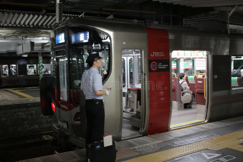 JR Train Waits at the Platform Editorial Photo - Image of driver, guard ...