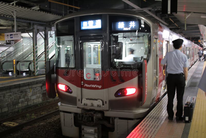 JR Train Waits at the Platform Editorial Image - Image of waiting ...