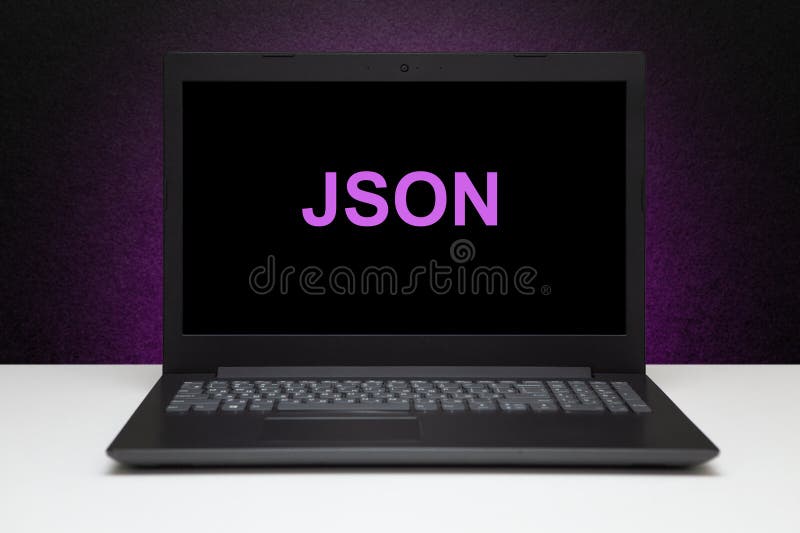 API Text on Laptop Screen on Textured Black Background with Blue Light ...