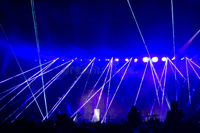 Jubilant Crowd at a Music Concert, Light Show, the Concept of Romance ...