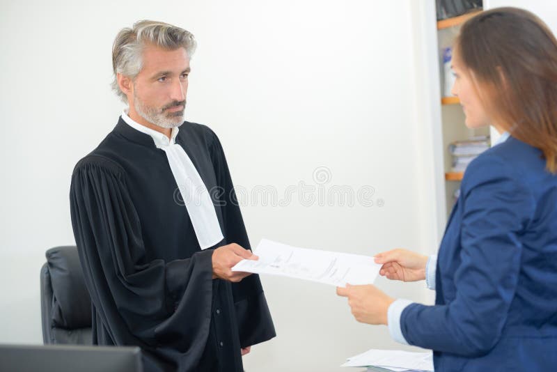 Judge Giving Paperwork Verdict Stock Photo - Image of right ...