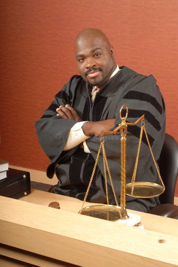 Judge at his desk stock photo. Image of attorney, arms - 5193662