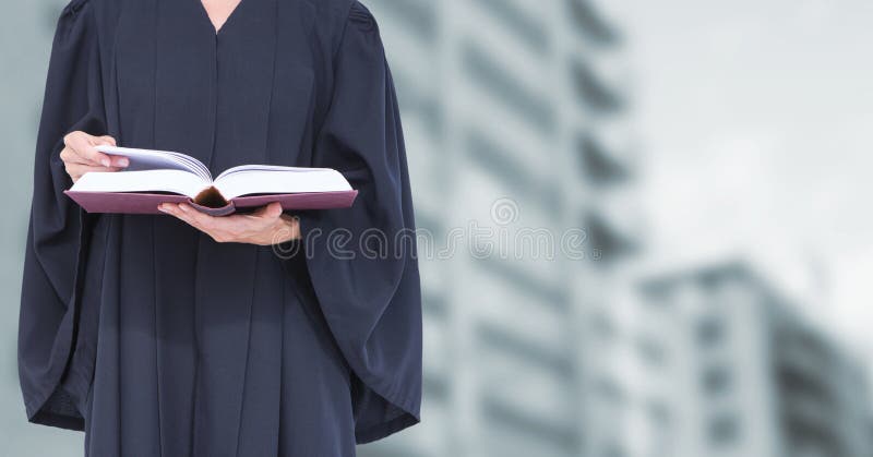 Judge Holding Book in Front of Buildings Stock Photo - Image of code ...