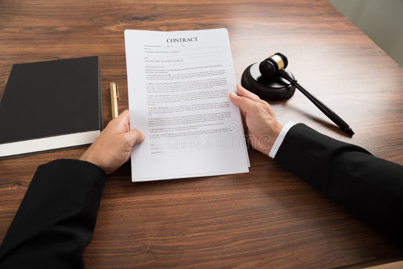 Judge holding documents stock image. Image of courtroom - 43870101