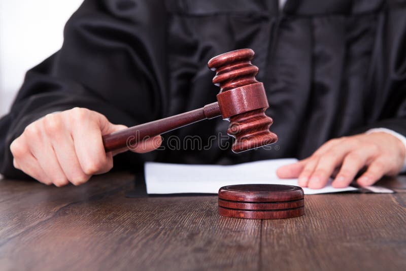 Judge holding mallet stock photo. Image of arbitration - 43870040