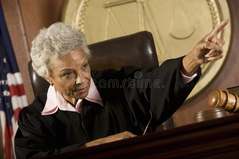 Judge Pointing in Courtroom Stock Photo - Image of government, flag ...