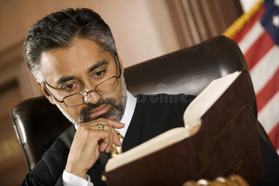 Judge Reading Law Book for Reference Stock Image - Image of judge ...