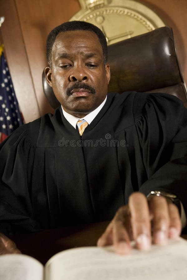 Judge Knocking Gavel in Courtroom Stock Image - Image of looking, gavel ...