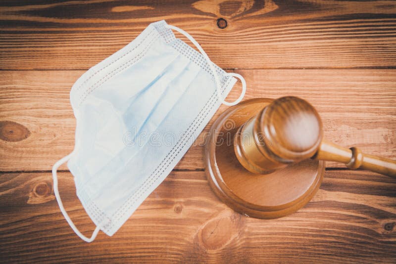 Judge`s hammer and mask stock image. Image of respiratory - 216697885