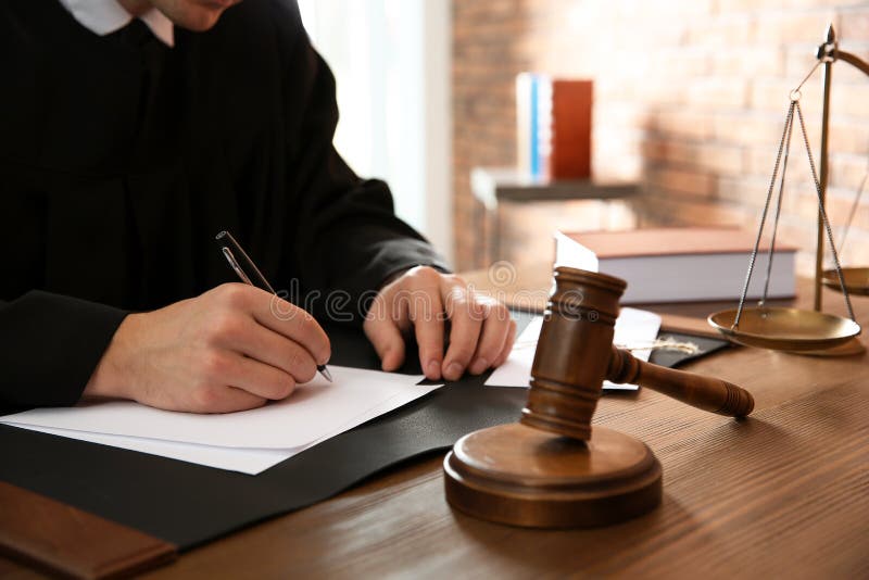 Judge Working with Papers and Gavel on Table. Law and Justice Concept ...