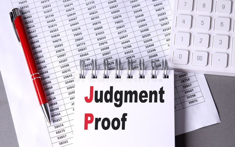 JUDGMENT PROOF Text on Notebook with Chart , Pen and Calculator Stock ...