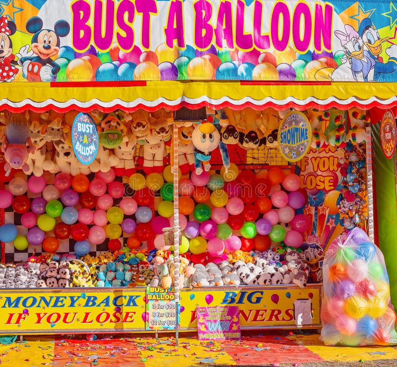 Juego Del Globo Que Revienta En Un Funfair Foto editorial - Imagen de ... Juego Del Globo Que Revienta En Un Funfair Foto editorial - Imagen de ...