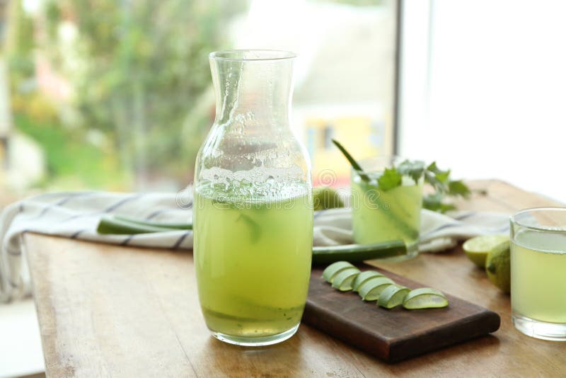 Jug of Aloe Vera Cocktail on Wooden Table Stock Image - Image of ...