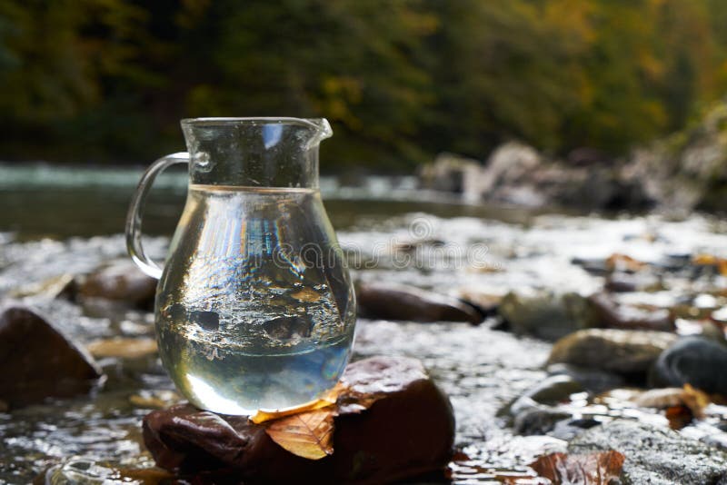 Jug of a Pure River of Water Stock Image - Image of potable, alpine ...