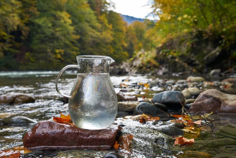 Jug of a Pure River of Water Stock Image - Image of potable, alpine ...