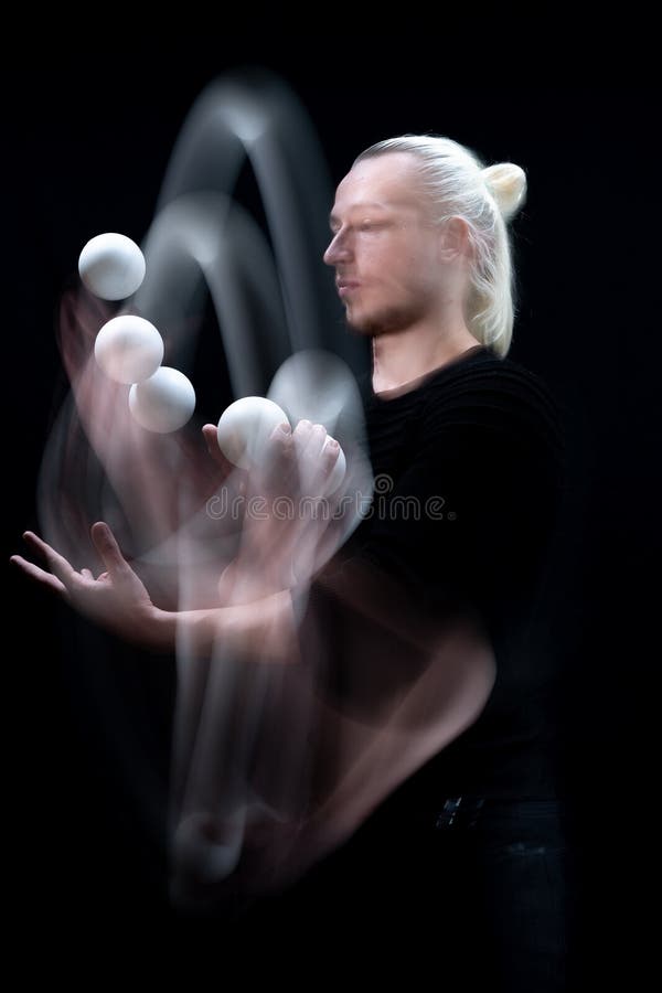 Juggler Throws Balls in Motion and Smoothed White Lines. Isolated on ...