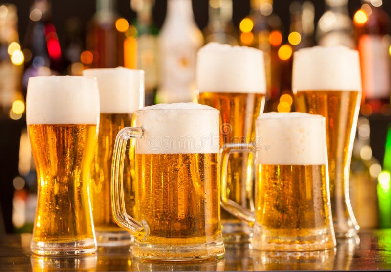 Jugs of Beer Served on Bar Counter Stock Photo - Image of refreshment ...