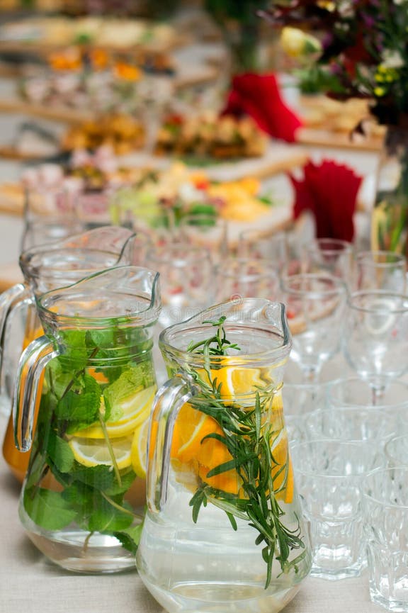 Jugs of Drinks at the Buffet Table Stock Photo - Image of decanter ...