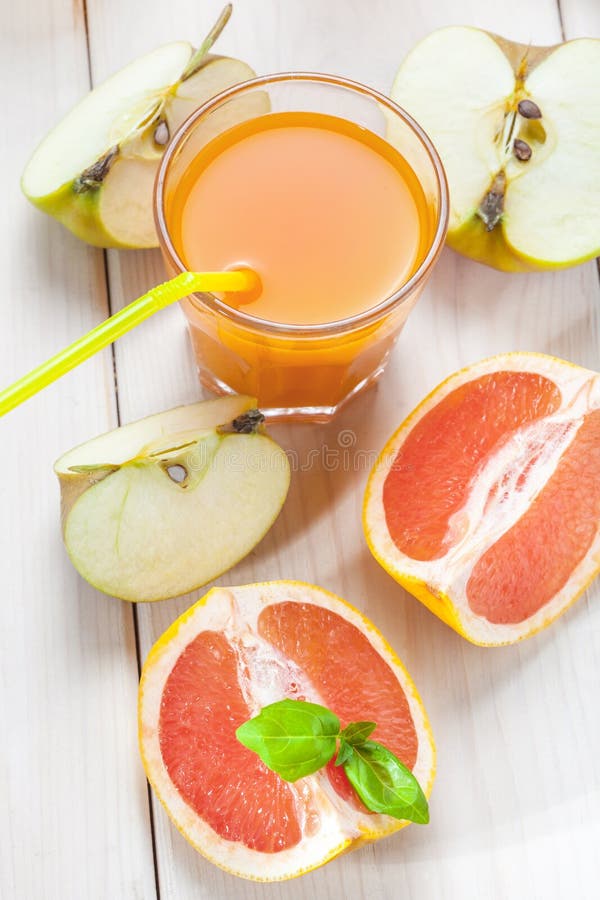 Juice of Apples and Red Grapefruit. Stock Image - Image of health ...