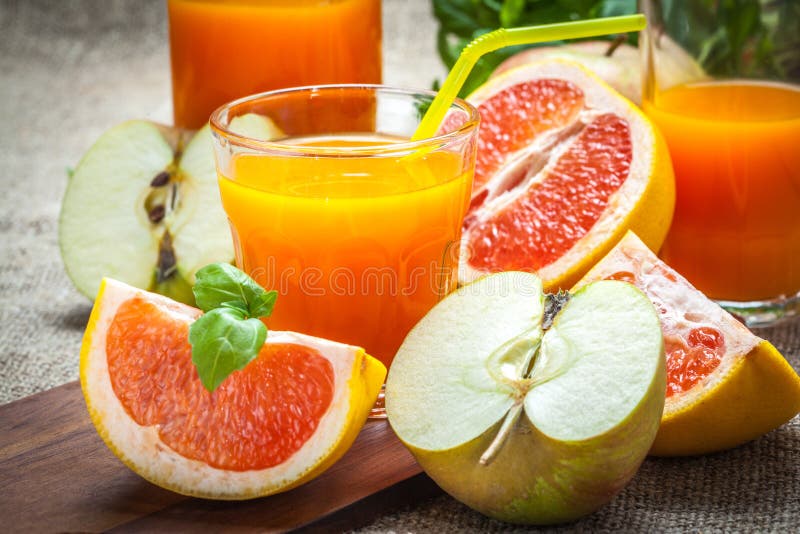 Juice of Apples and Red Grapefruit. Stock Photo - Image of vegetarian ...