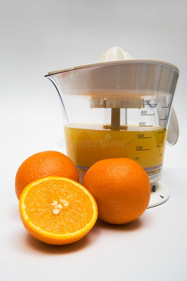 Juice extractor with juice stock photo. Image of citrus - 5709966