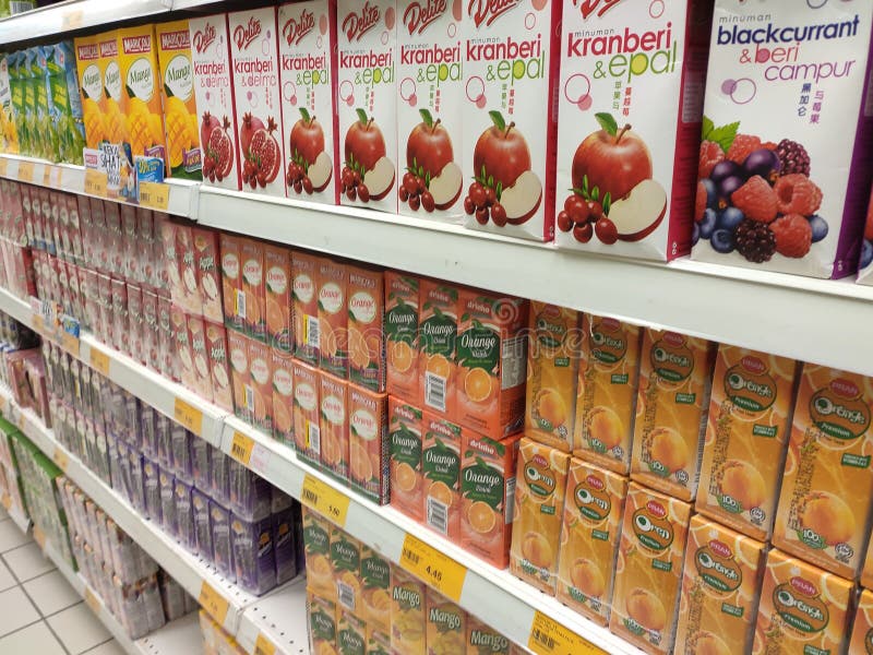 Juice with Fruit Flavour Packed in a Paper Box Container Editorial ...