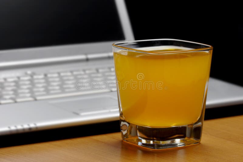 Juice and laptop stock image. Image of laptop, oranges - 11869279