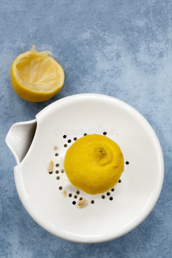 Juicing a Lemon stock photo. Image of white, juice, halved - 28598648