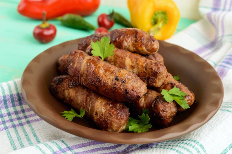 Juicy Grilled Rolls of Minced Meat Wrapped in Bacon Stock Image - Image ...