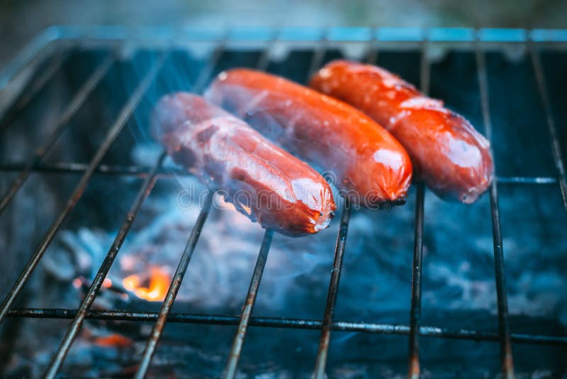 Juicy Hot Dog Sausages Cooking on Fire Stock Image - Image of campfire ...