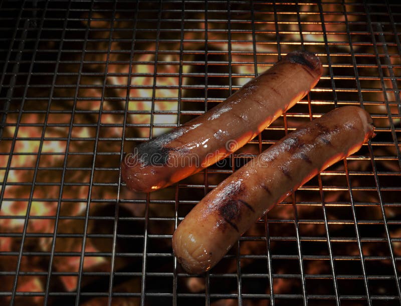 Juicy Hot Dogs Cooking on the Grill Stock Photo - Image of meal, grey ...