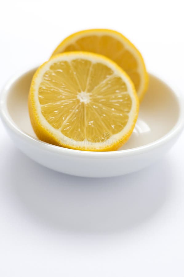 Juicy Lemon Cut in Half in Dish Stock Image - Image of fruit, citron ...
