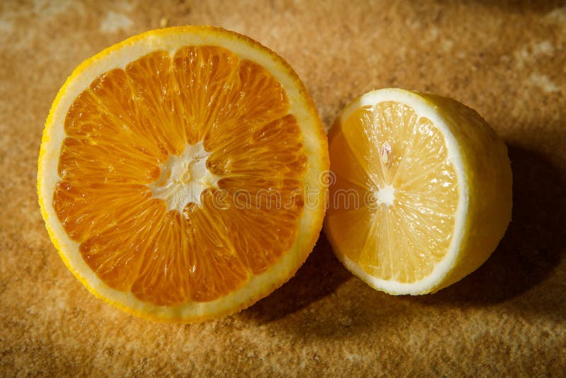 Juicy Lemon Cut in Half Lies on Table Stock Photo - Image of freshness ...