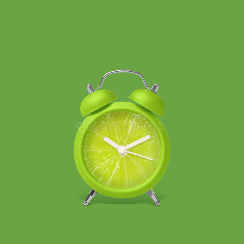 Juicy Lime on Alarm Clock Dial Against Green Background. Creative ...