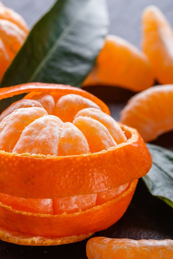 Juicy Mandarin on a Dark Stone Background Stock Image - Image of slices ...