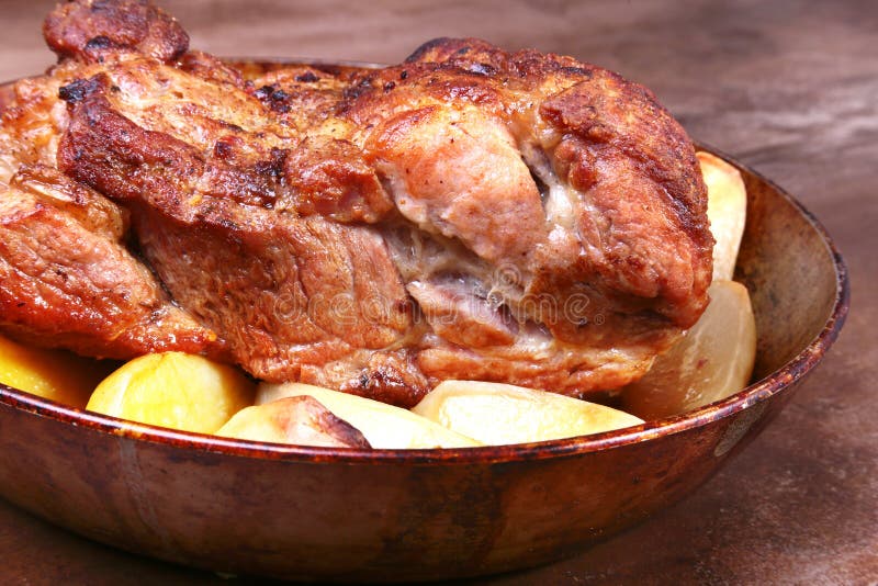 Juicy Pork Neck Chops are Grilled with Potatoes on a Stone Background ...