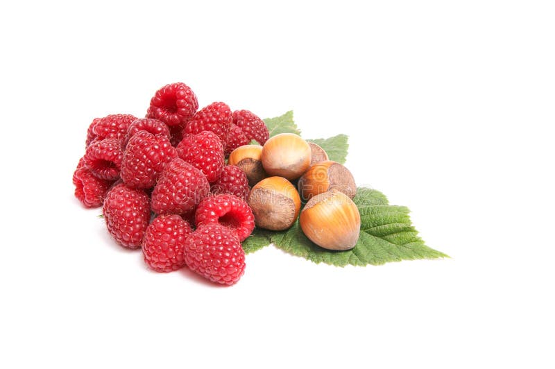 Juicy Raspberries and Nuts on a White. Stock Photo - Image of purity ...