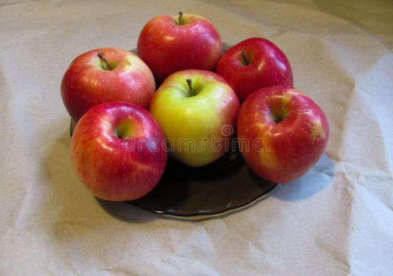 Juicy Red Florina Apples on a Black Plate Stock Image - Image of juice ...