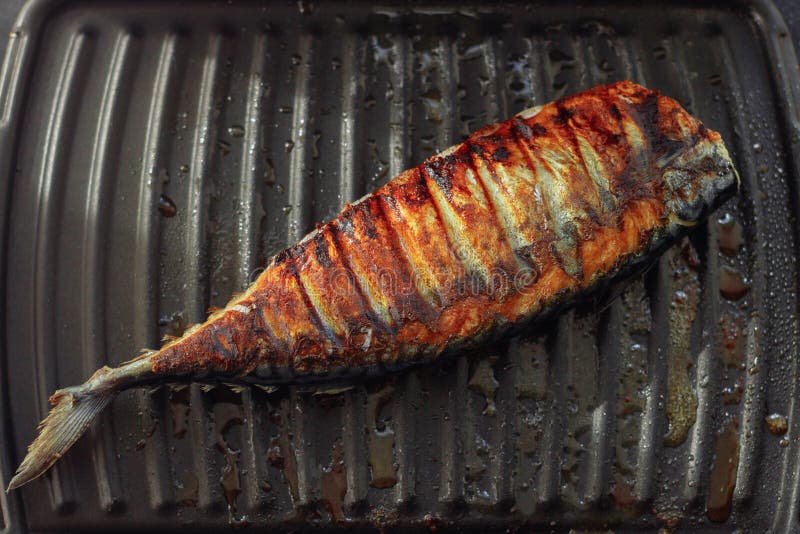 Juicy Tasty fish grilled stock photo. Image of fresh - 148649388