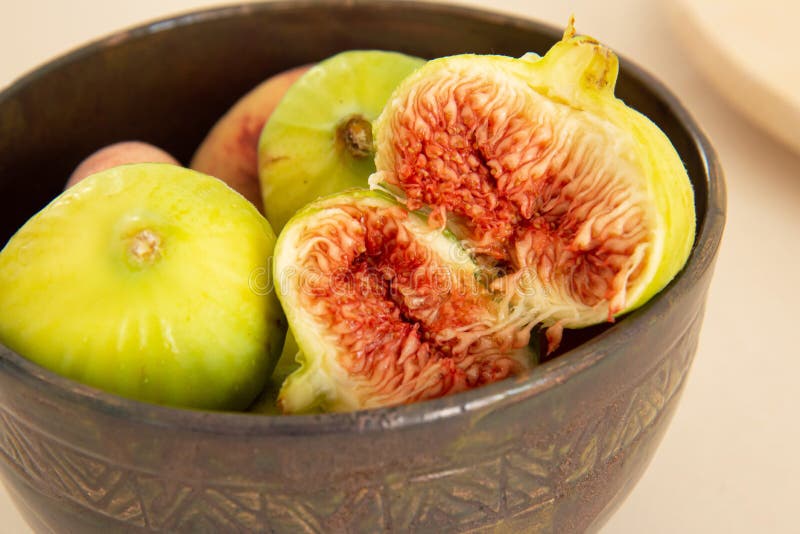 Juicy Tasty Ripe Figs on Texture Clay Plate Stock Photo - Image of ...