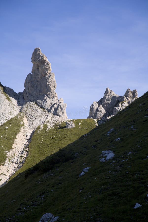 Rock Tower on a Natural Rock Formation Against an Ocean Background and ...