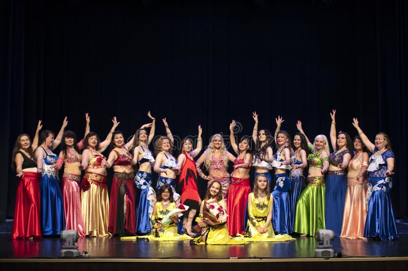 A Group Of Women Of Different Ages In Costumes For Arabic Belly Dancing
