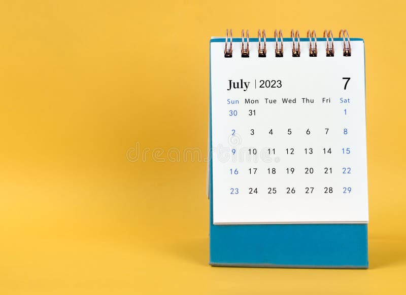 The July 2023 Desk Calendar on Yellow Color Background Stock Photo ...