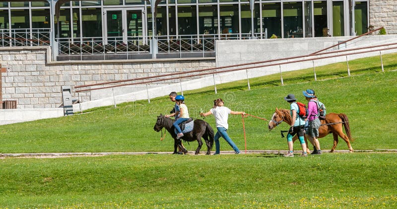 Kid riding Pony editorial photo. Image of female, activity - 173257166