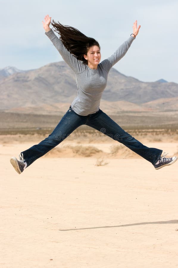 Jumping teenager girl stock image. Image of girl, successful - 12697619