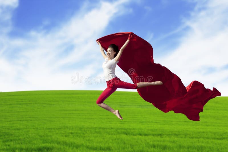 Jump for enjoying freedom stock photo. Image of meadow - 24925600